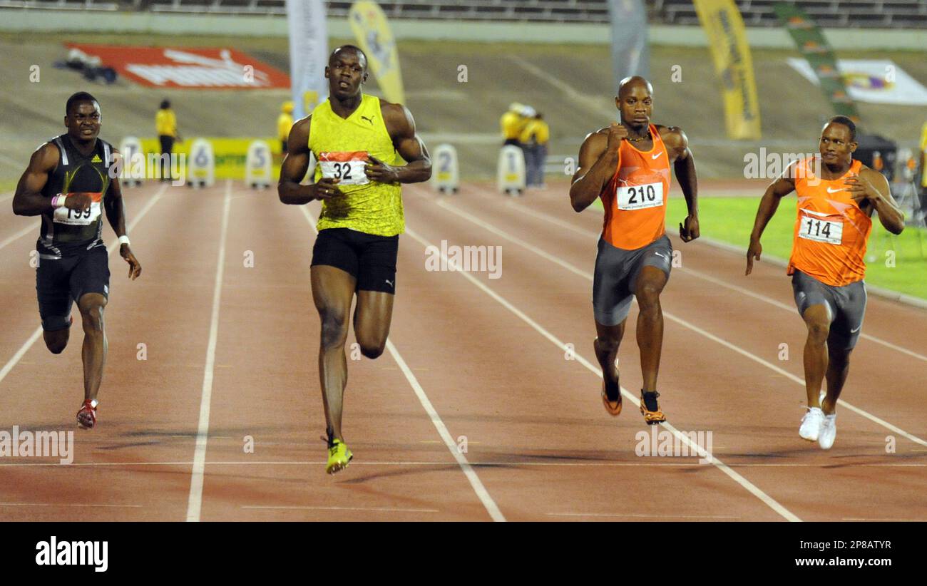 Olympic sprint double champion Usain Bolt of Jamaica, second left ...