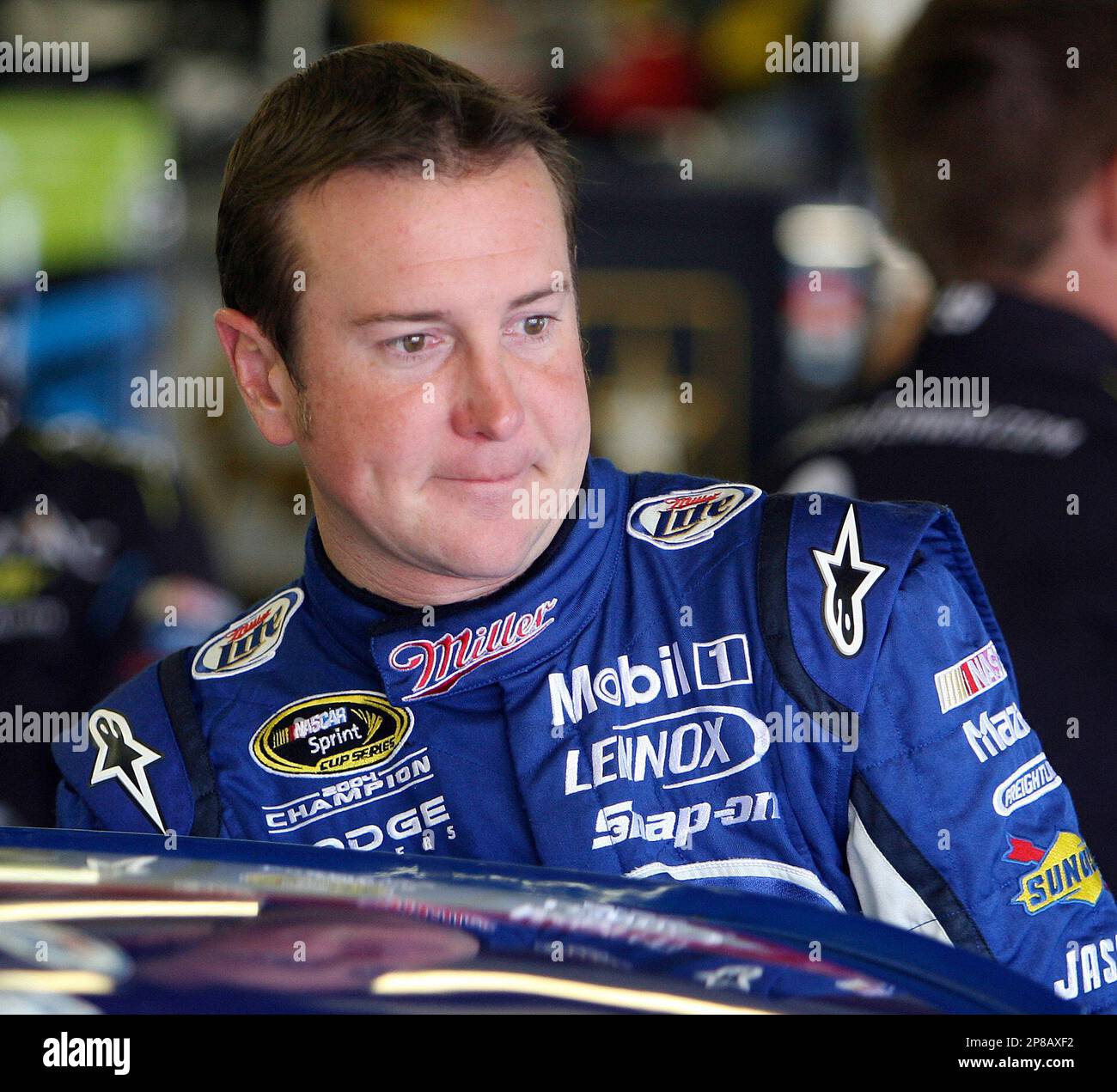 NASCAR driver Kurt Busch climbs into his car for practice for Sunday's ...