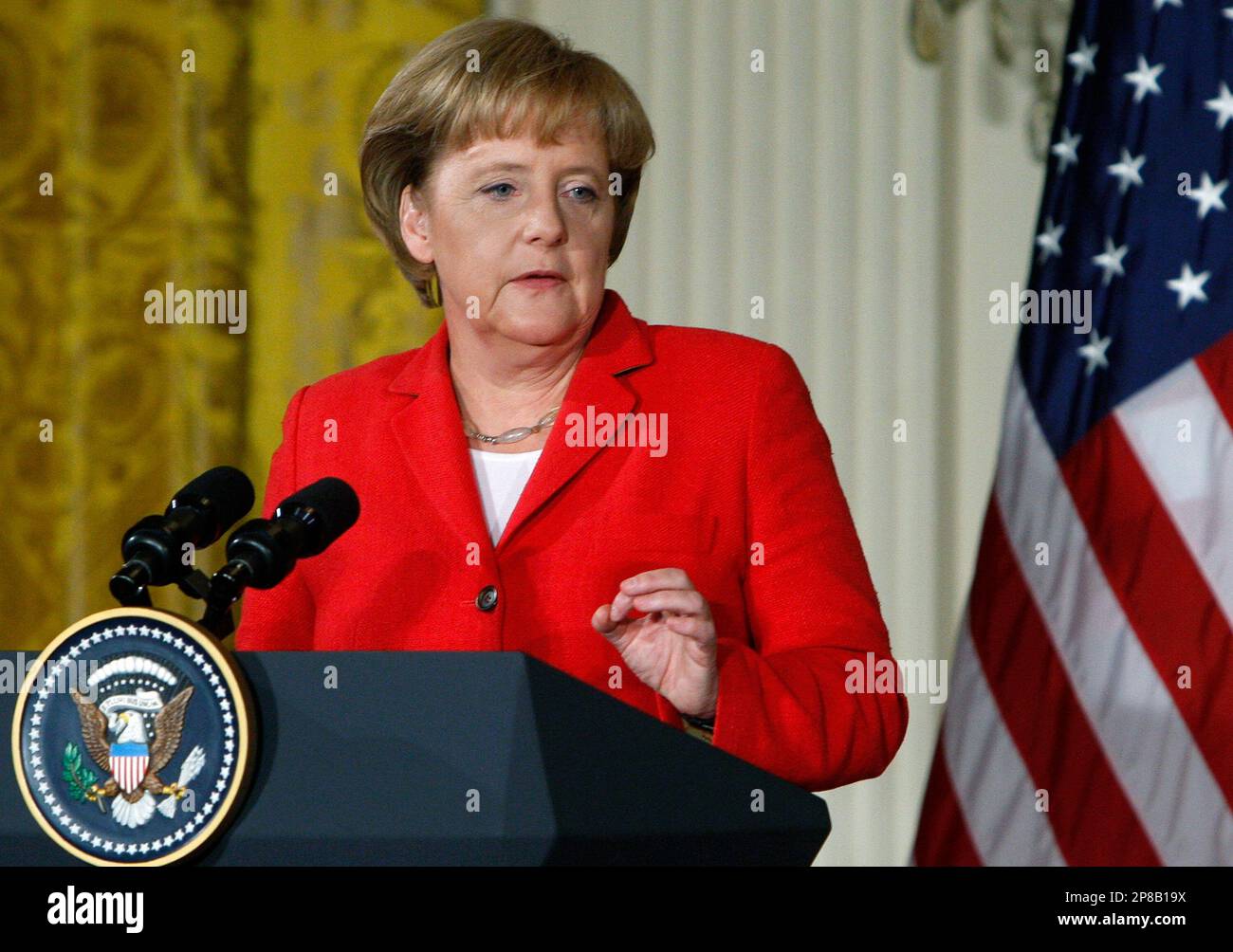 German Chancellor Angela Merkel gestures during her joint news ...