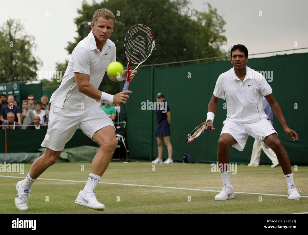 India's Mahesh Bhupathi, right and Mark Knowles of the Bahamas in ...