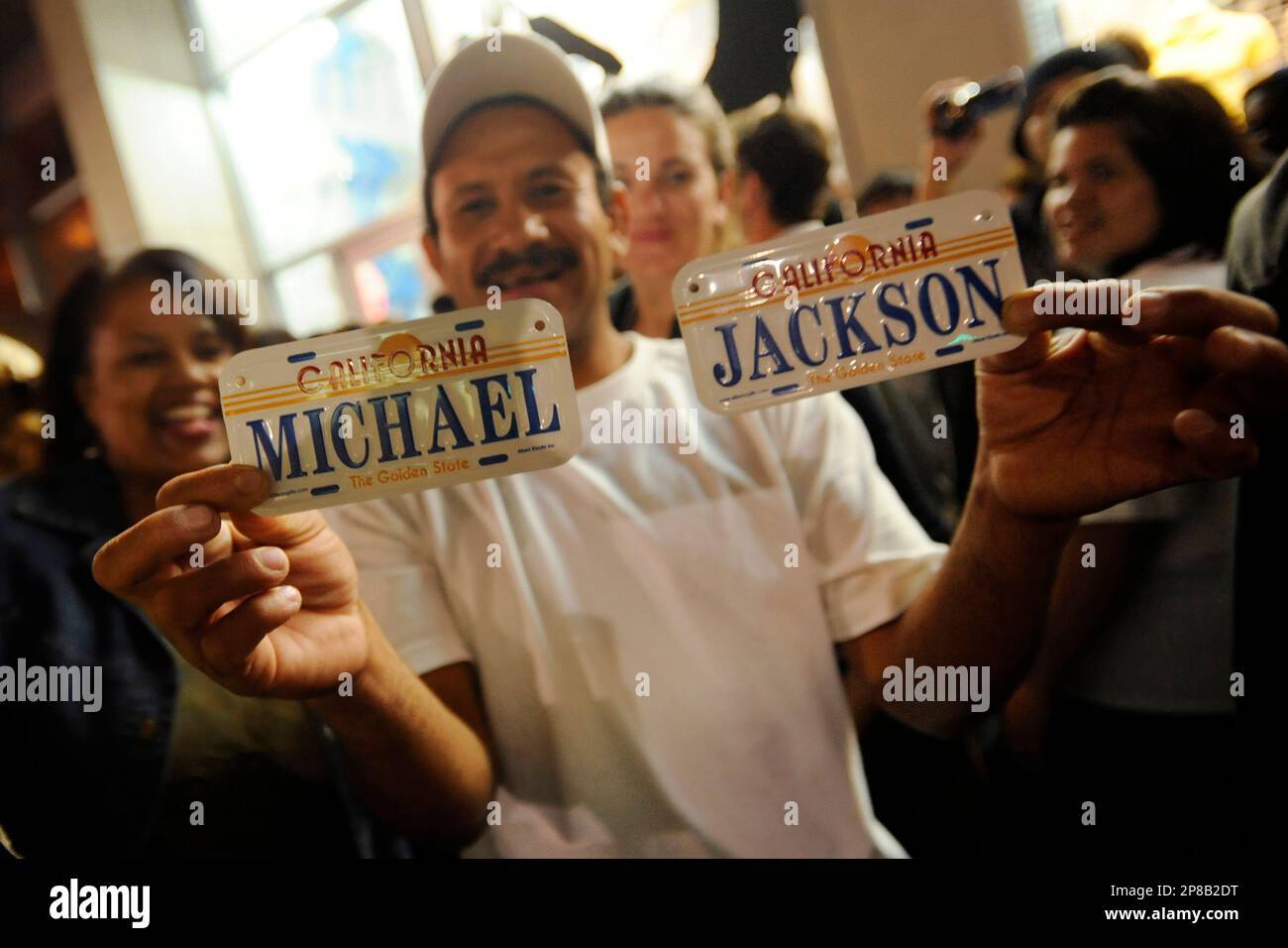 Jesus Garcia of Mexicali, Mexico, holds up Michael Jackson license ...
