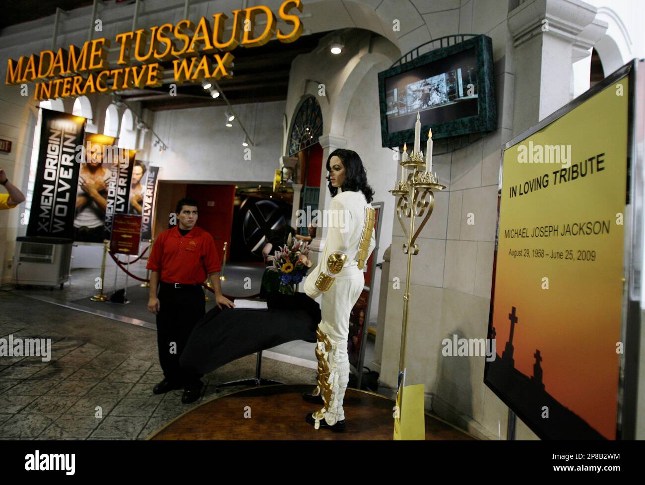 A wax replica of Michael Jackson stands outside of Madame Tussaud's Wax ...