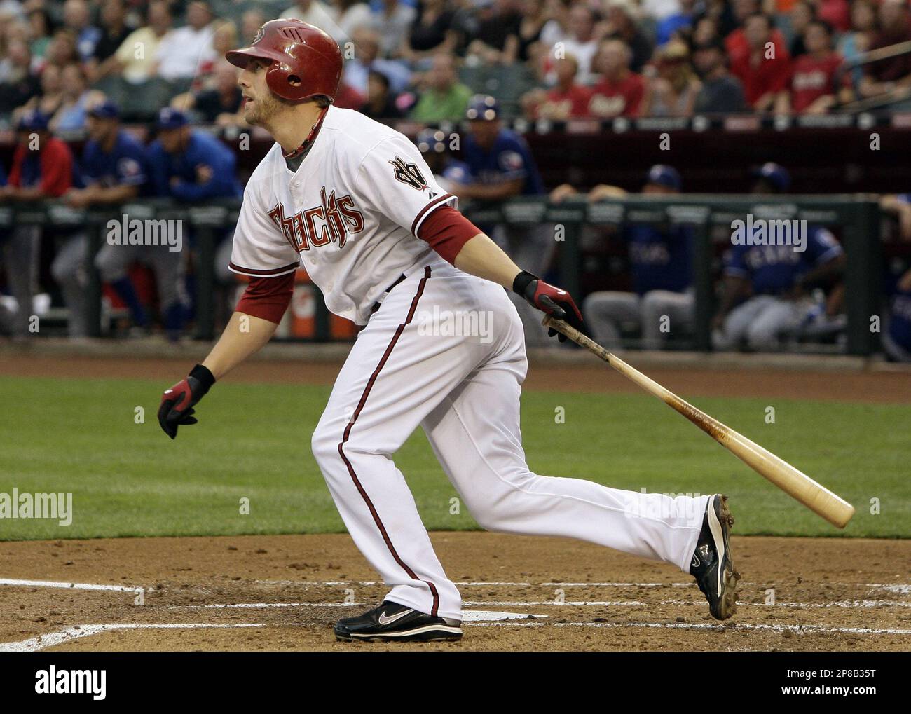 Arizona Diamondbacks' Mark Reynolds watches his two-run home run clear ...