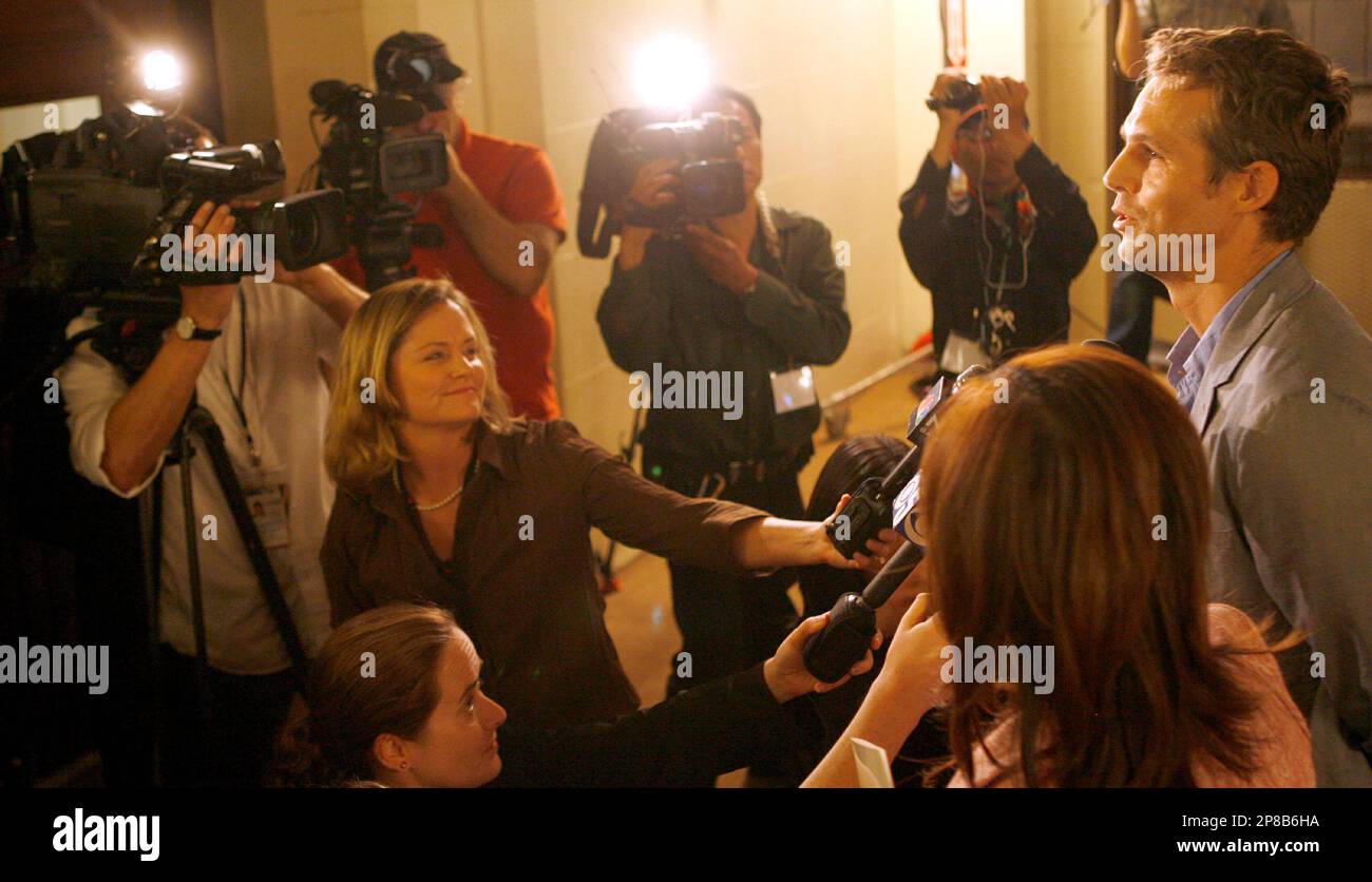 Iain Clayton, husband of Laura Ling, speaks to the media at the Academy ...