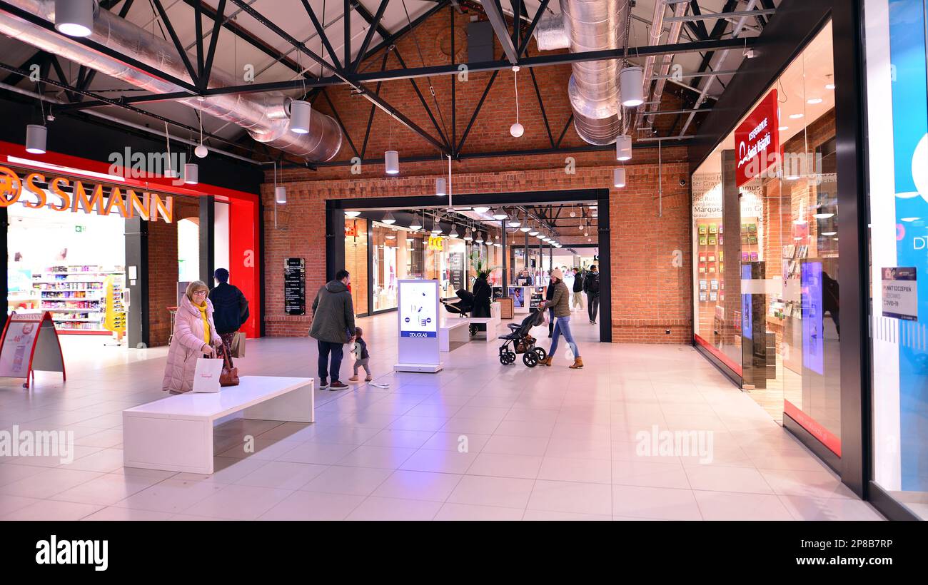 Warsaw, Poland. 8 March 2023. People walking in a shopping mall past ...