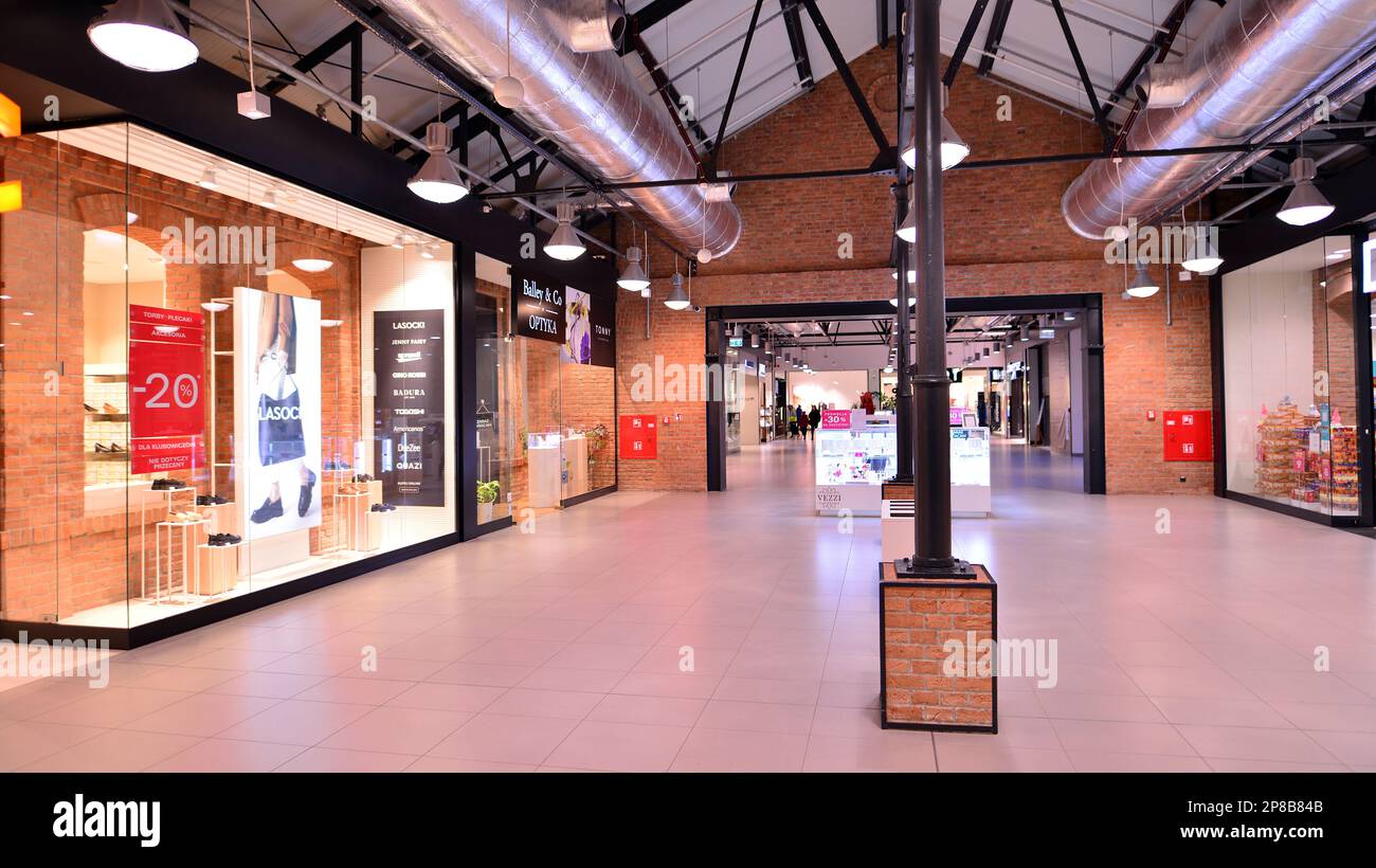 Warsaw, Poland. 8 March 2023. People walking in a shopping mall past ...