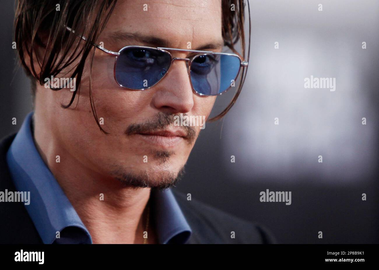 Cast member Johnny Depp arrives at the premiere of "Public Enemies" in ...