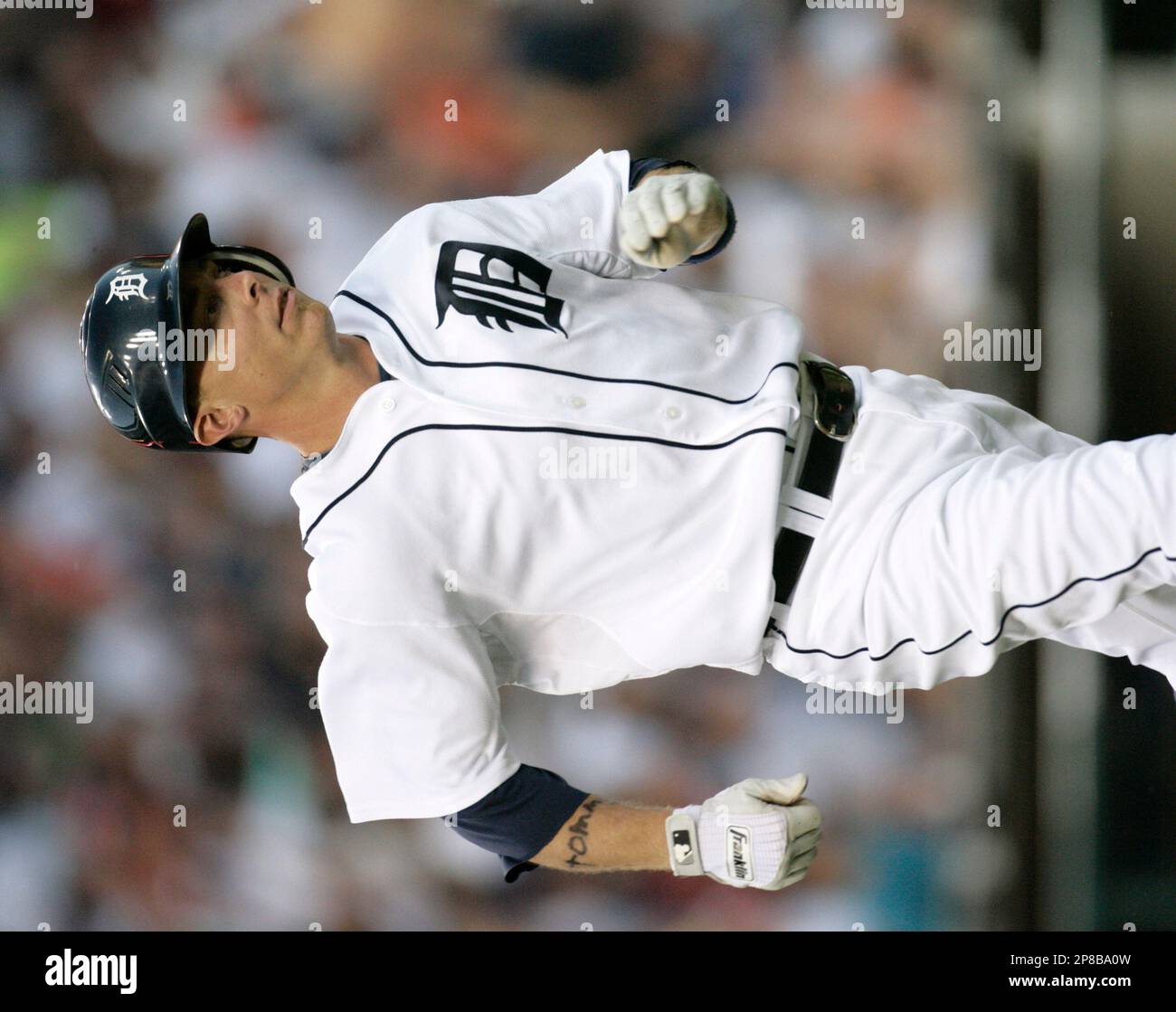 Detroit Tigers' Brandon Inge rounds the bases after hitting a two-run ...