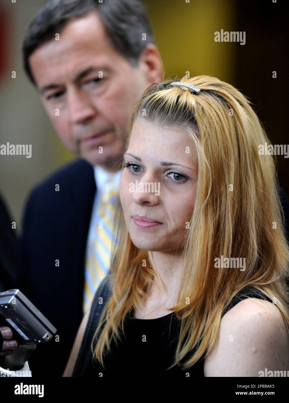 Karolina Obrycka, right, and her attorney Terry Ekl speak outside of ...