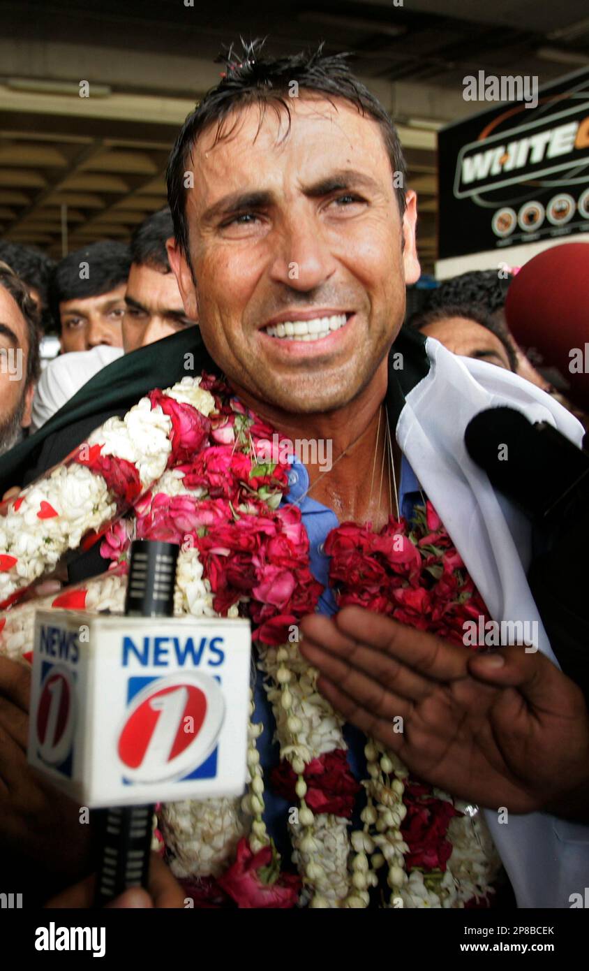 Pakistan's Twenty20 World Cup winning captain Younis Khan is greeted by ...