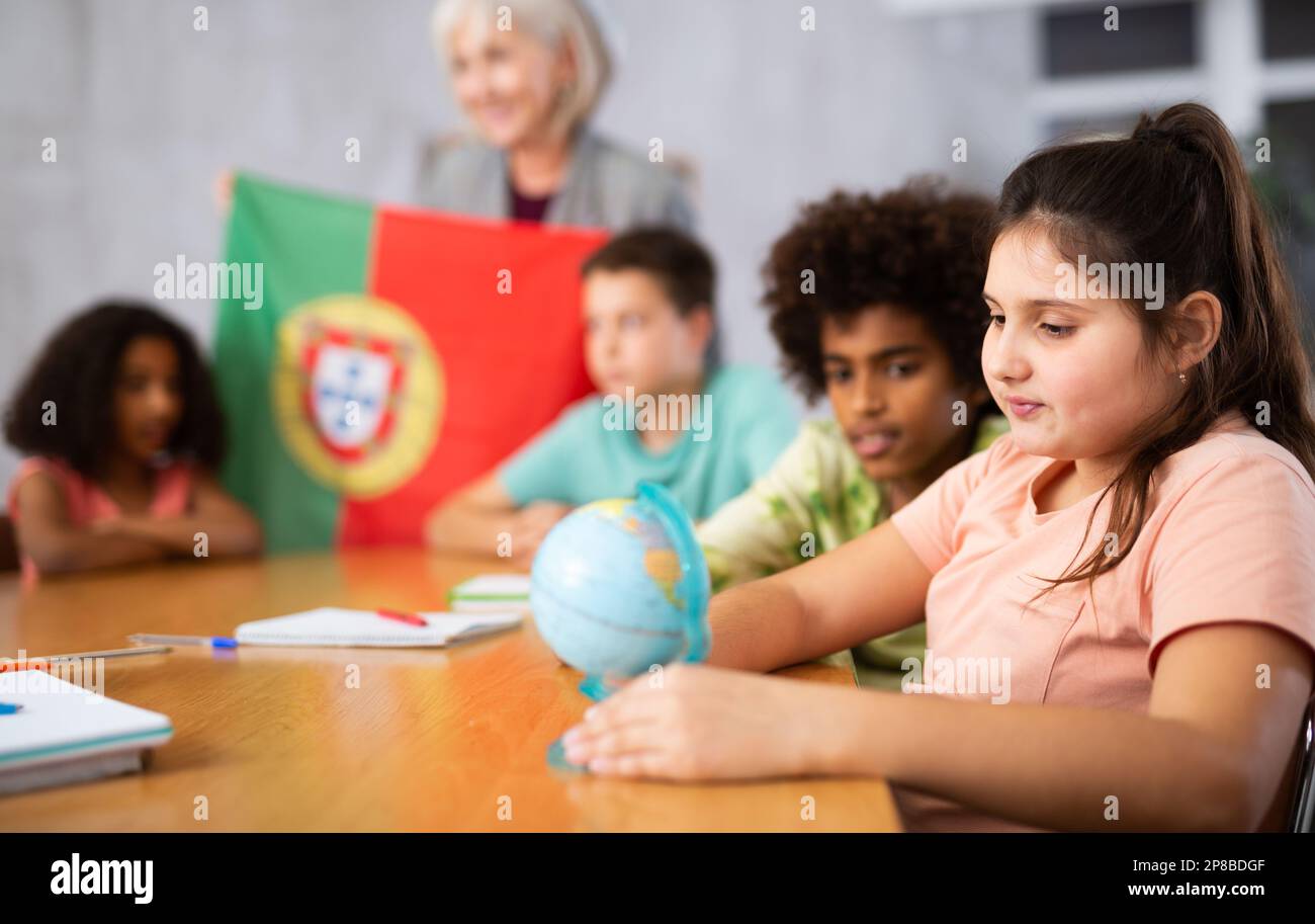 Female teacher kids in geography hi-res stock photography and images ...