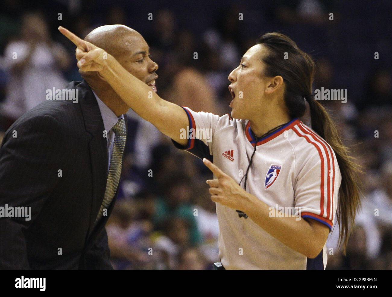 Phoenix Mercury coach Corey Gaines, left, argues with referee Cameron ...