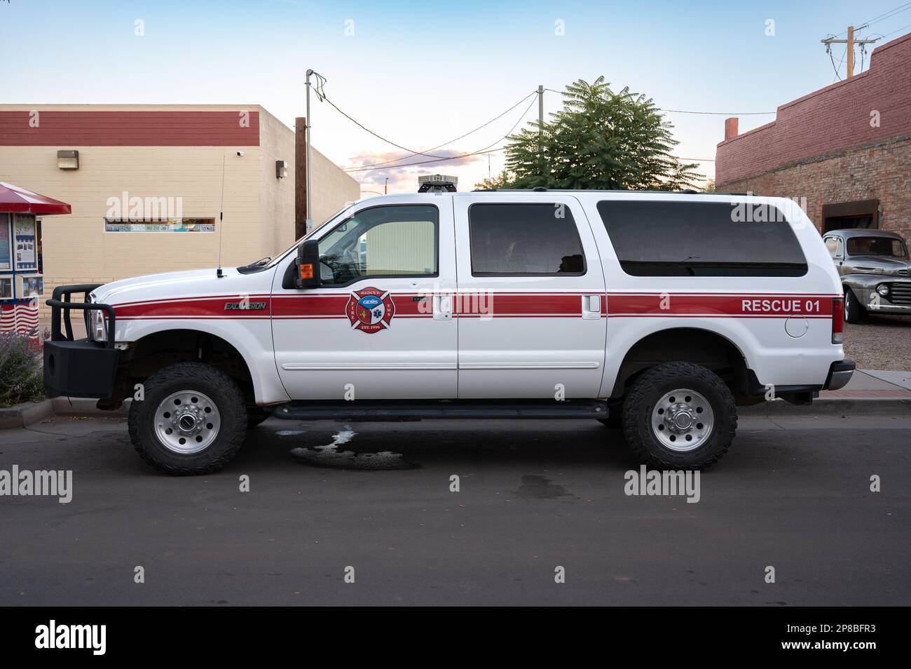 A white SUV Ford Excursion rescue truck Stock Photo - Alamy