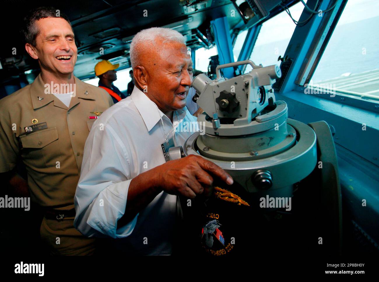 USS George Washington Commanding Officer David Lausman, left, and Palau ...
