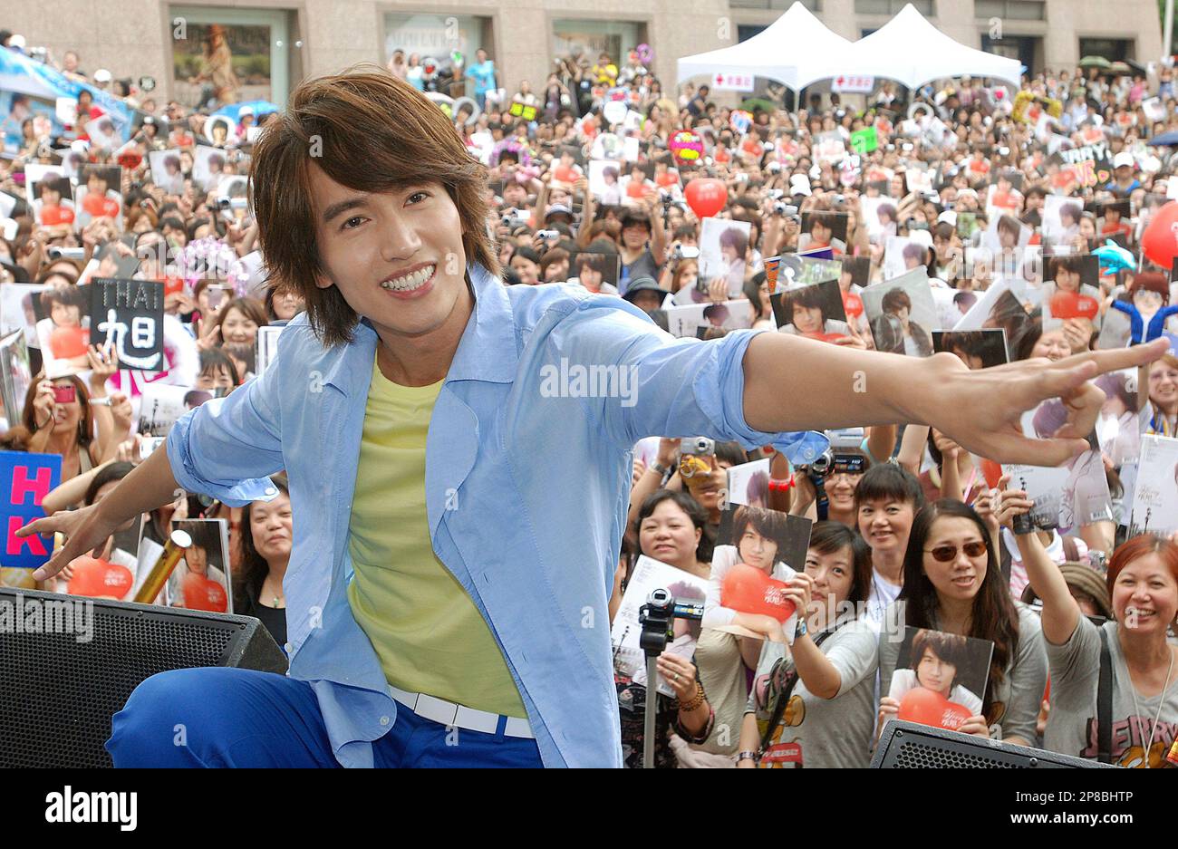 Taiwanese singer Jerry poses for photographers during an event to ...
