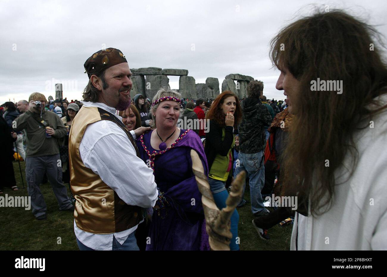 Carl Klinkenborg, left, his wife Gigha, center, look at druid Frank ...