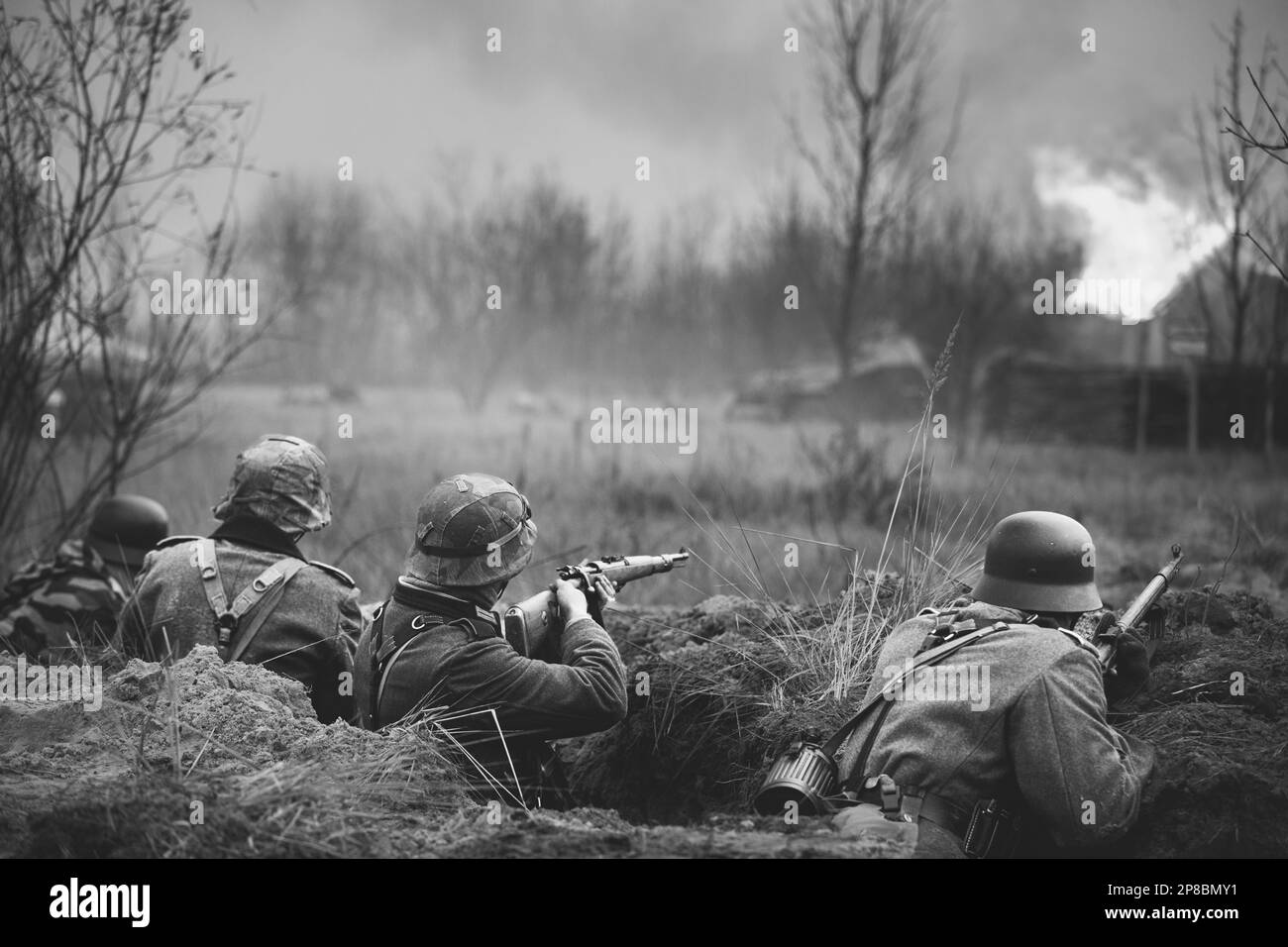 Re-enactors Armed Rifles And Dressed As World War Ii German Wehrmacht ...