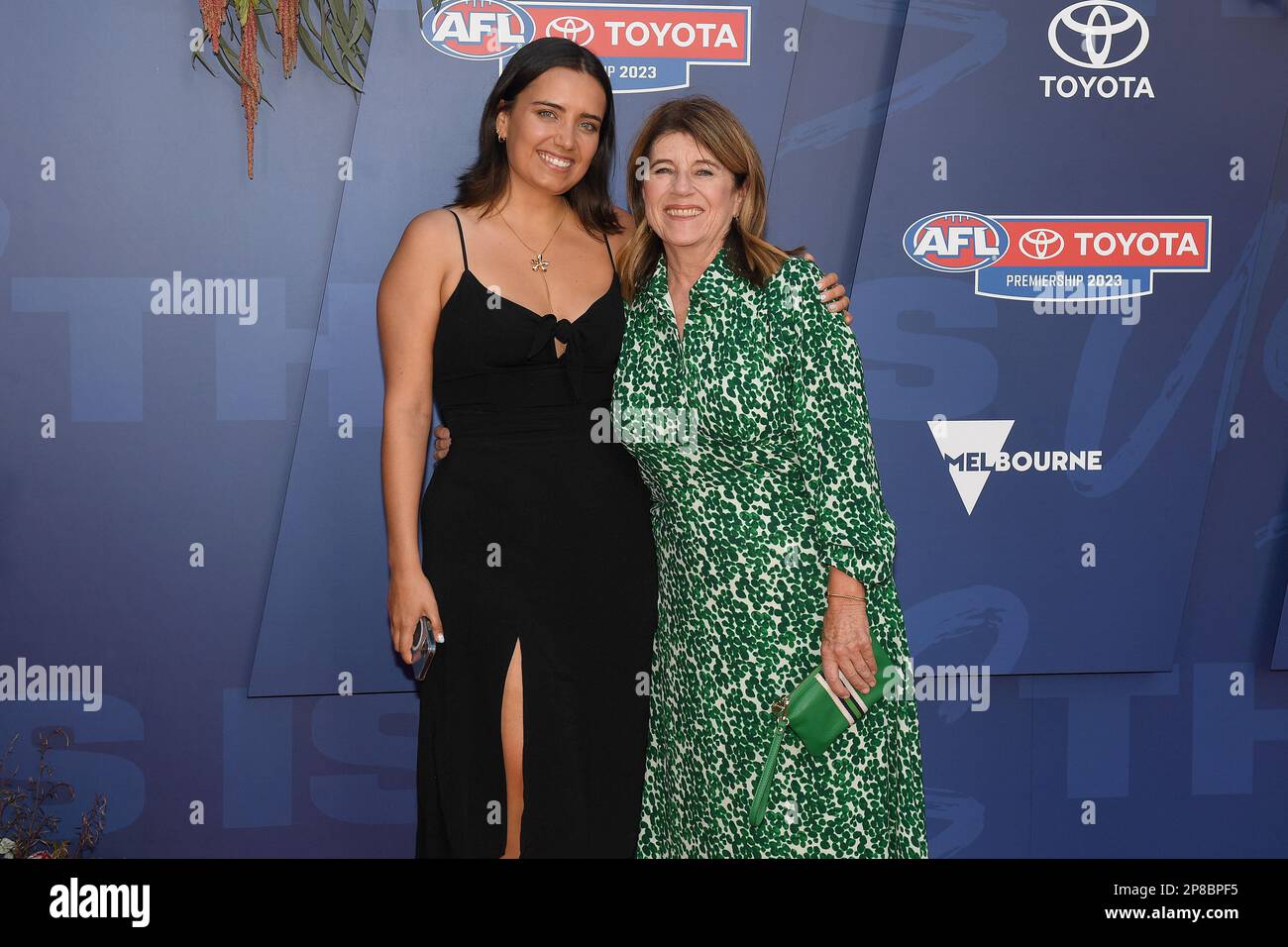 Caroline Wilson (right) arrives with her daughter during the 2023 AFL ...