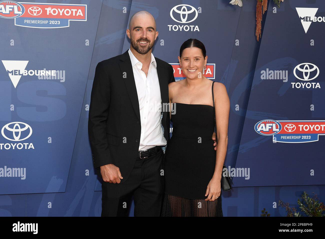 Steele Sisebottom and Alisha Edwards arrive during the 2023 AFL ...