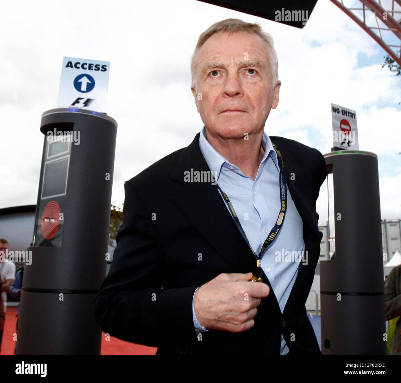 FIA President Max Mosley arrives in the paddock during free practice ...
