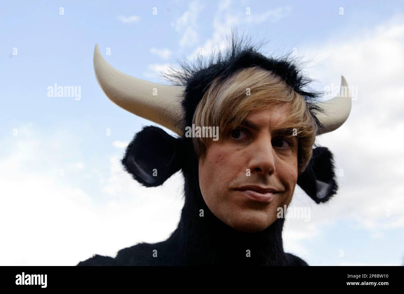 British actor Sacha Baron Cohen, dressed as a bull, as the character ...