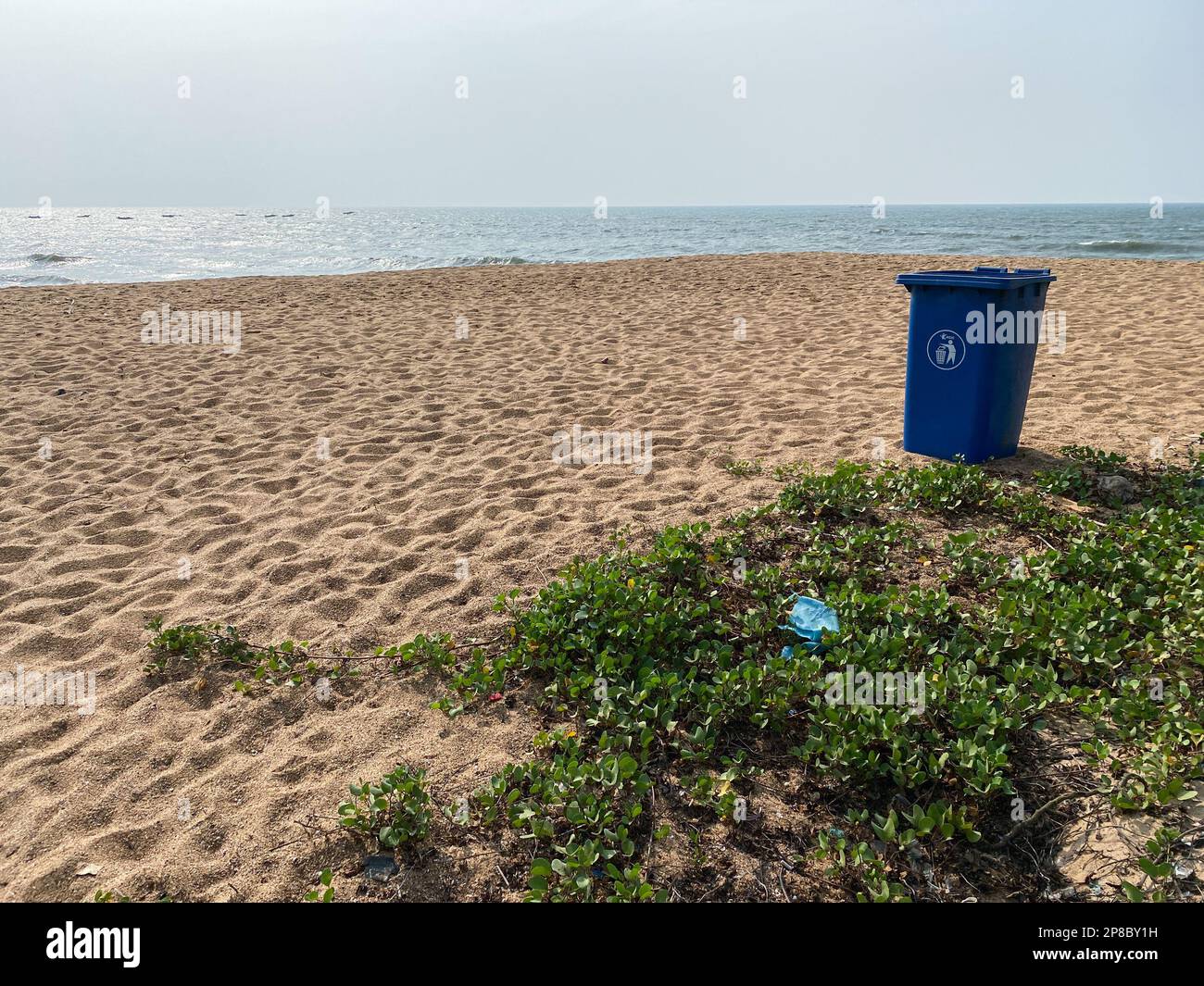 Candolim, Goa, India - January 2023: A garbage bin on a pristine beach ...
