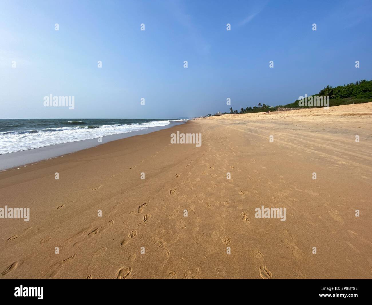 A beautiful beach with no people in the village of Sinquerim in North ...