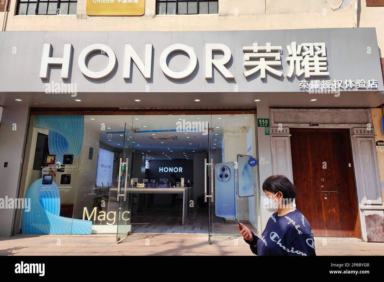 SHANGHAI, CHINA - MARCH 9,2023 - A pedestrian passes the Honor Flagship store in Shanghai, China ...