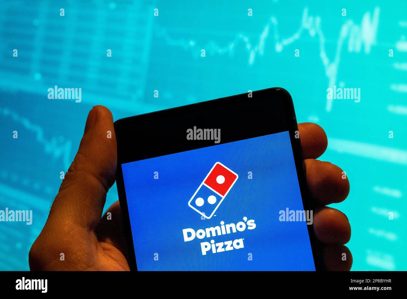 In this photo illustration, the American pizza restaurant chain Domino ...