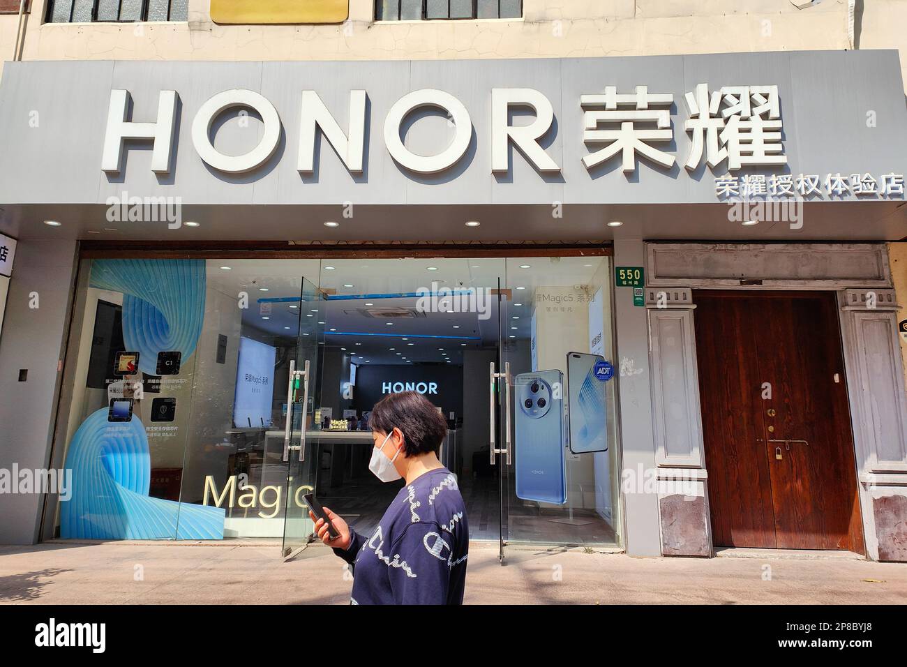 SHANGHAI, CHINA - MARCH 9,2023 - A pedestrian passes the Honor Flagship ...