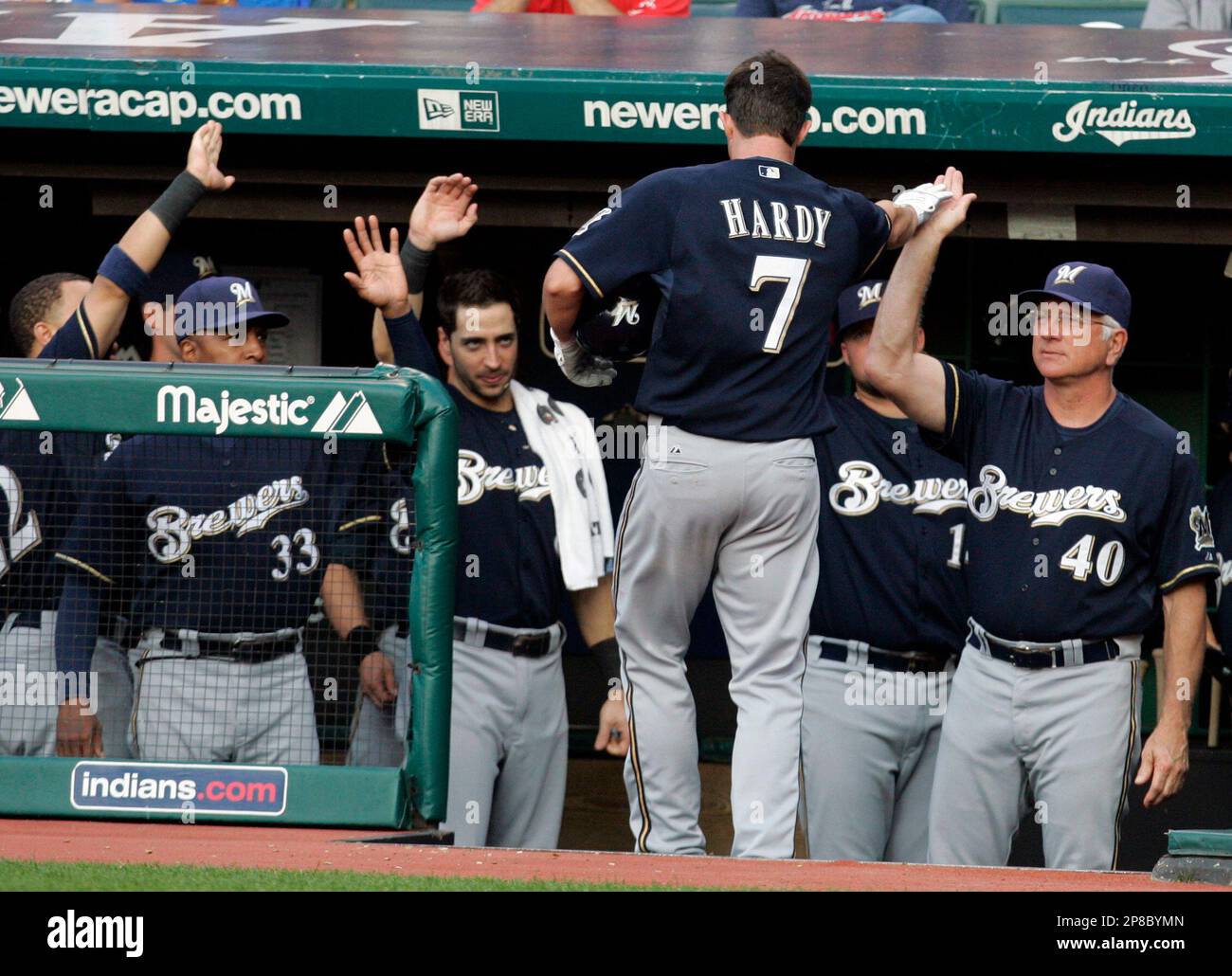 Milwaukee Brewers' J.J. Hardy (7) is congratulated by manager Ken Macha ...
