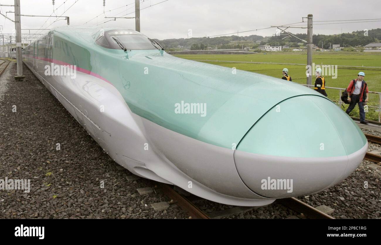 The new E5-type bullet train, sporting an extended nose, is unveiled to ...