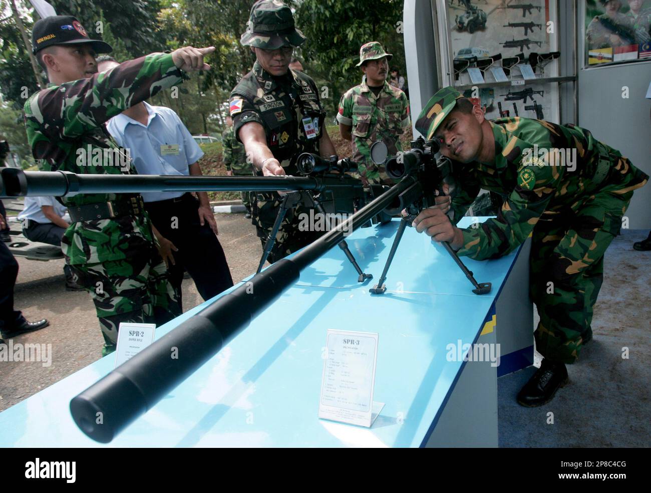 Soldiers of Indonesia, left, The Philippines, center, and Bangladesh ...