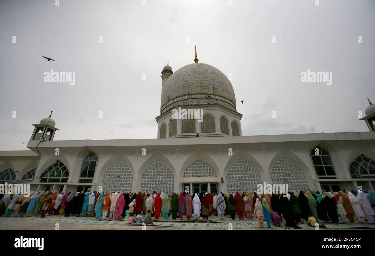 Kashmiri Muslim women pray on the death anniversary of Abu Bakr Siddiq the first Caliph of Islam ...