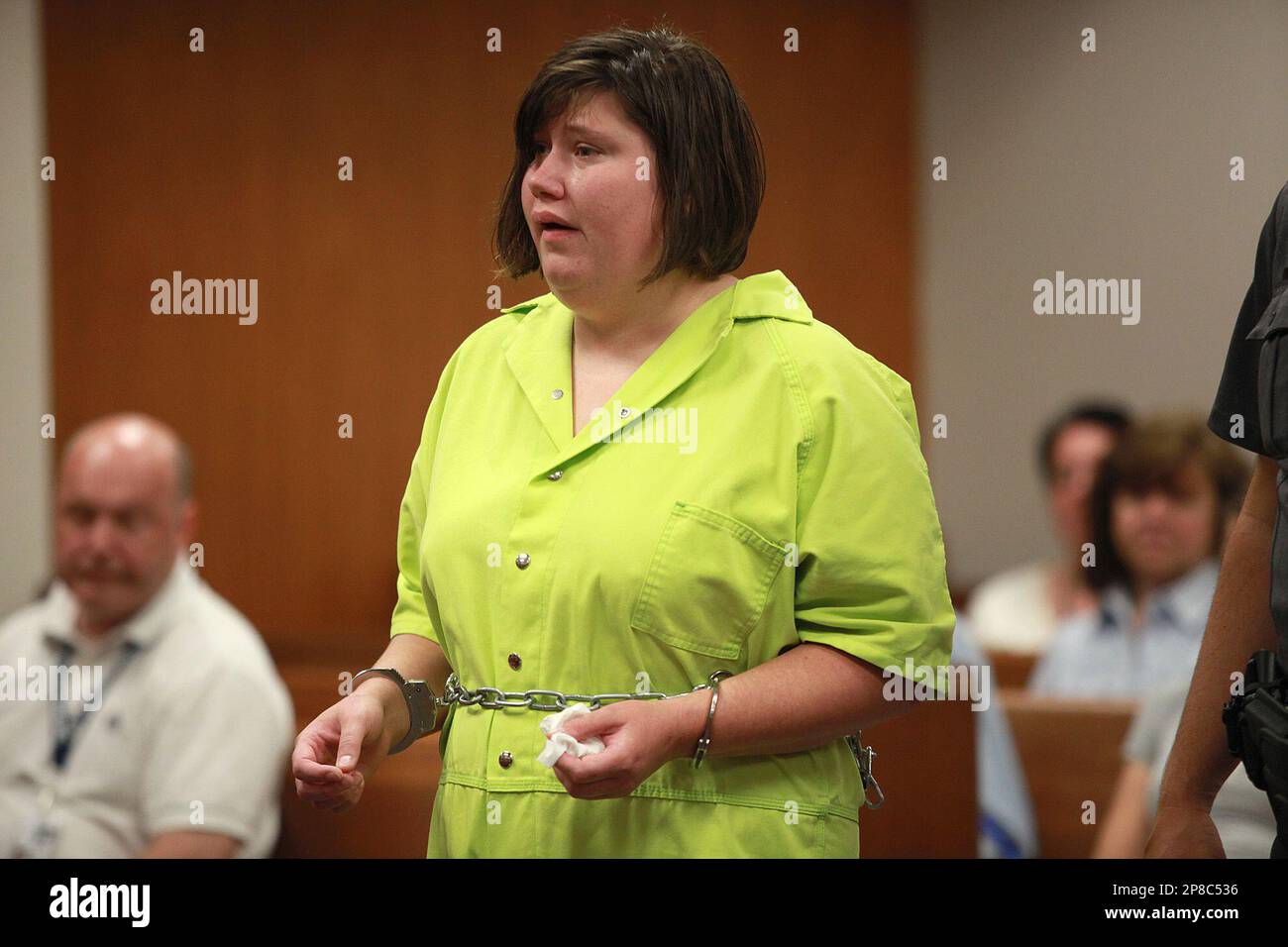 Korena Roberts enters the Washington County courtroom in Hillsboro, Ore ...