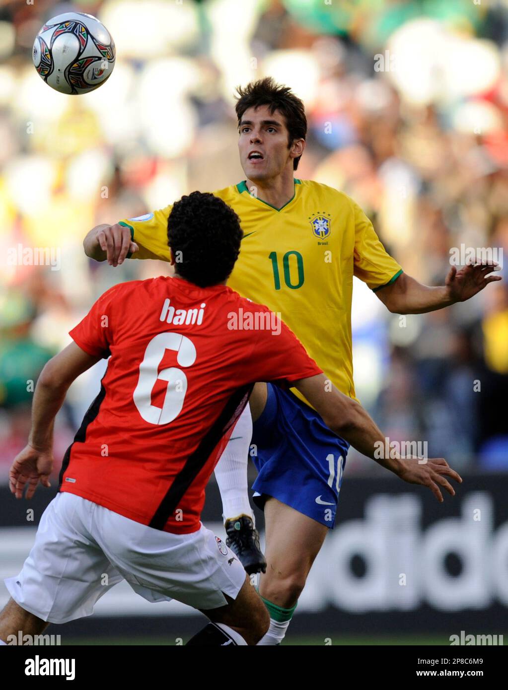 Brazil's Kaka, right, controls the ball past Egypt's Hani Said before ...