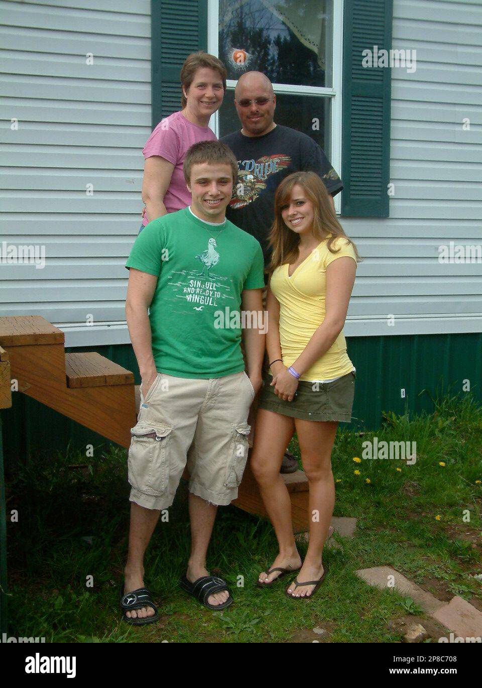 The Sprague family, front left to right: Levi and Sasha, and back left ...