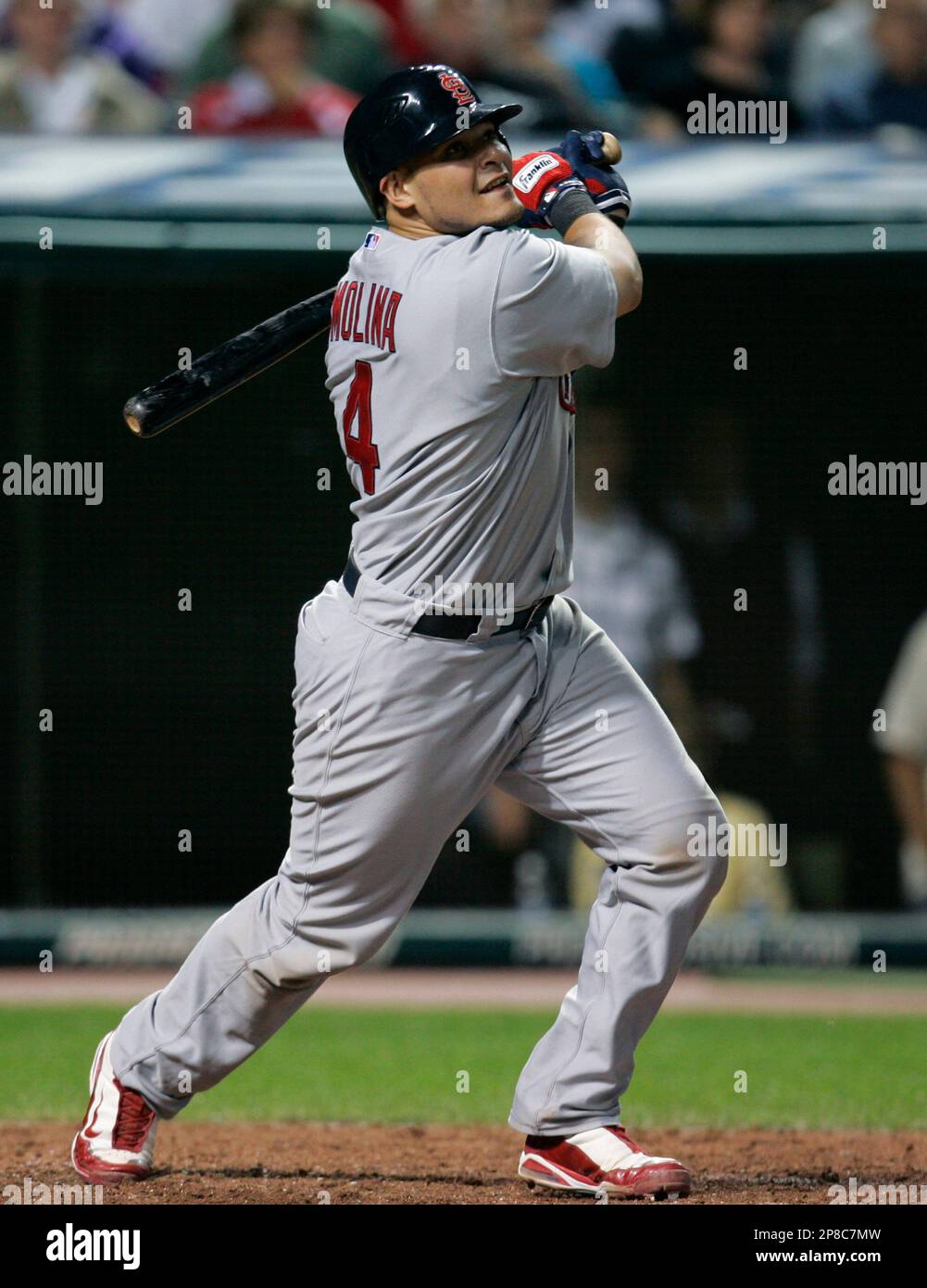 St. Louis Cardinals' Yadier Molina watches his ball after hitting a ...