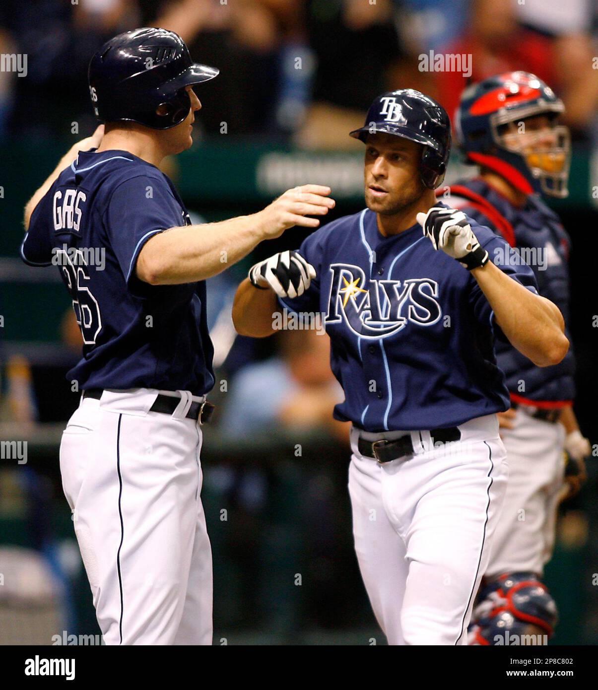 Tampa Bay Rays' Gabe Kapler, right, celebrates with teammate Gabe Gross ...