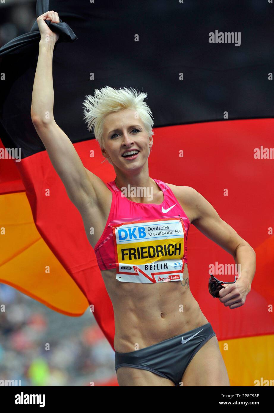 Ariane Friedrich Of Germany Waves A German Flag After She Won The Women
