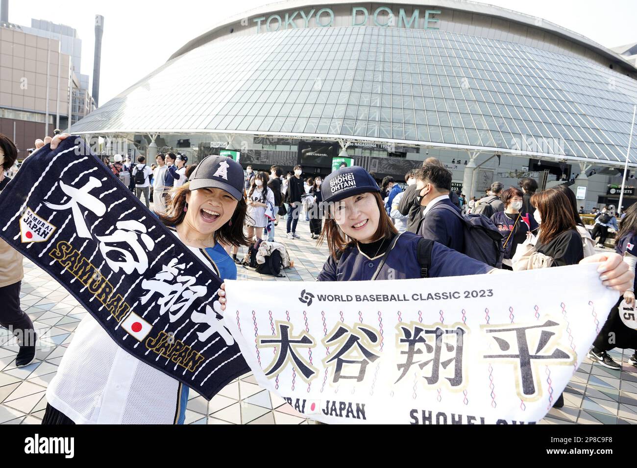 Supporters of Japan cheer in front of Tokyo Dome in Tokyo on March 9 ...