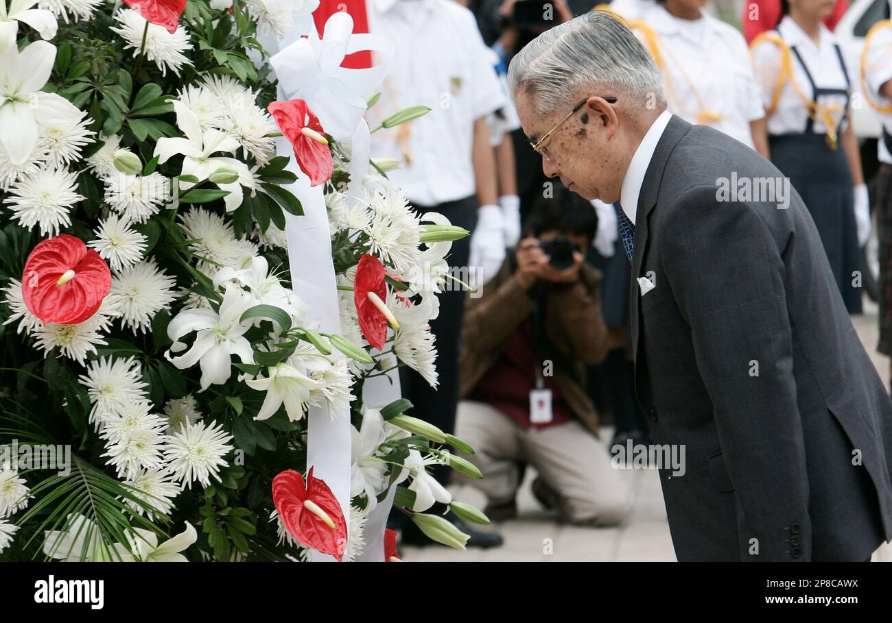 Japan's Prince Hitachi attends a wreath-laying ceremony in Lima ...