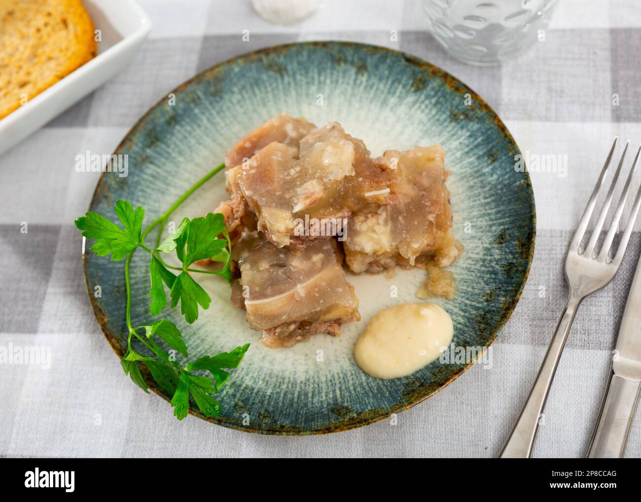 Pieces of homemade pork aspic, meat jelly Stock Photo - Alamy
