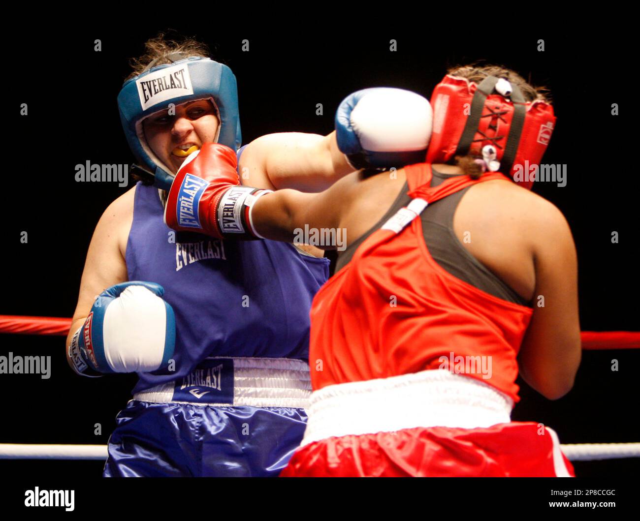 Traynora Locke, right, lands a punch against Sonya Lamonakis during ...