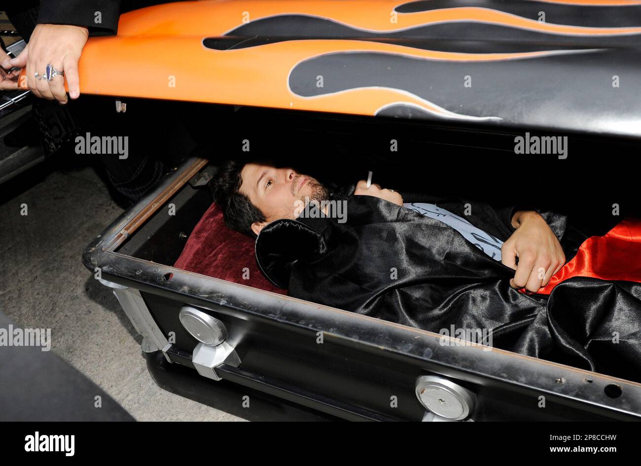 Bret Roberts, a cast member in the vampire film "Raven," is secured ...