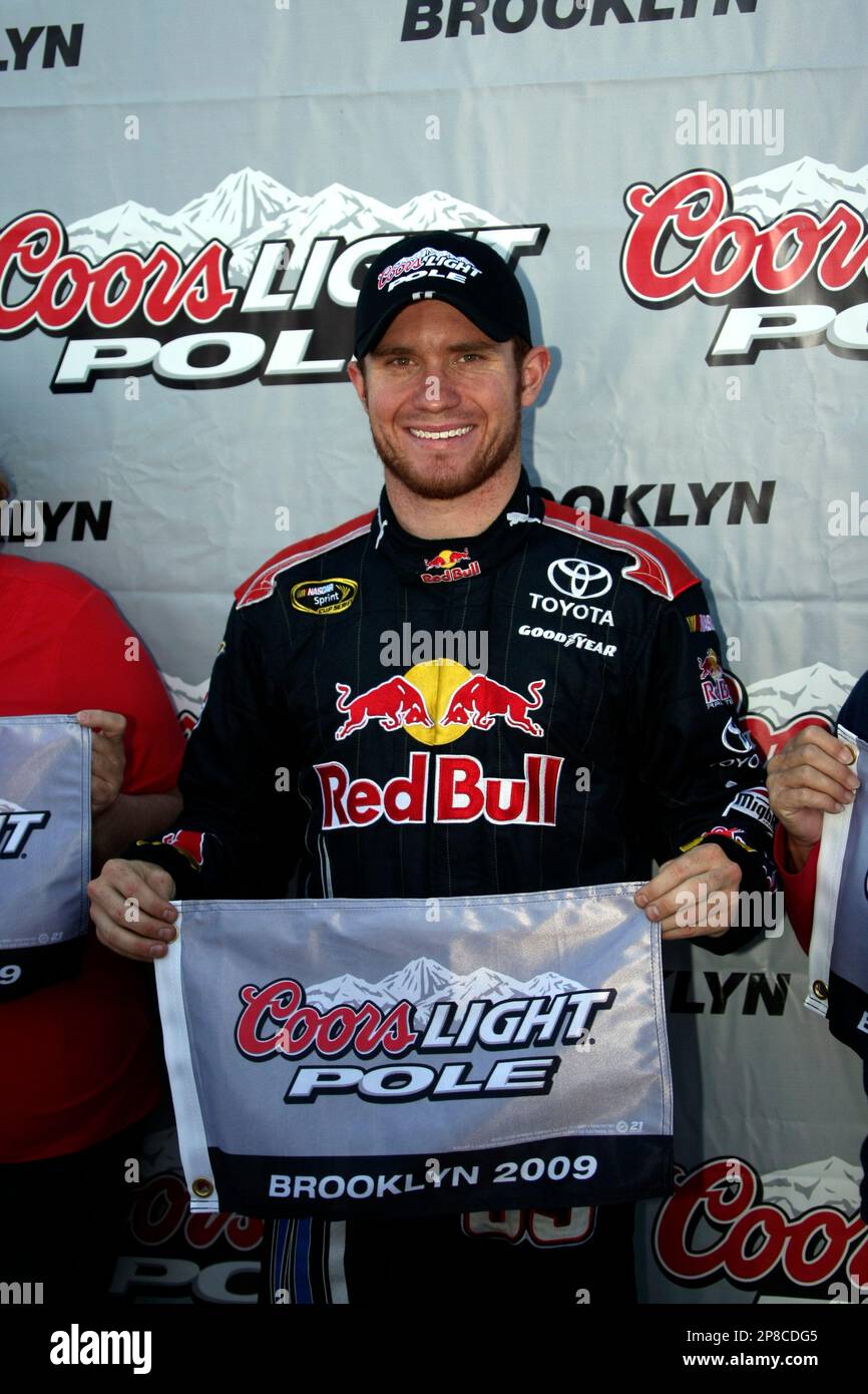 NASCAR driver Brian Vickers holds the pole flag after qualifying for ...