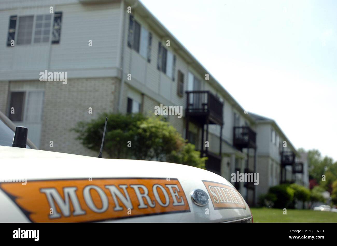 A Monroe police car is seen outside the Arms Apartments complex in ...