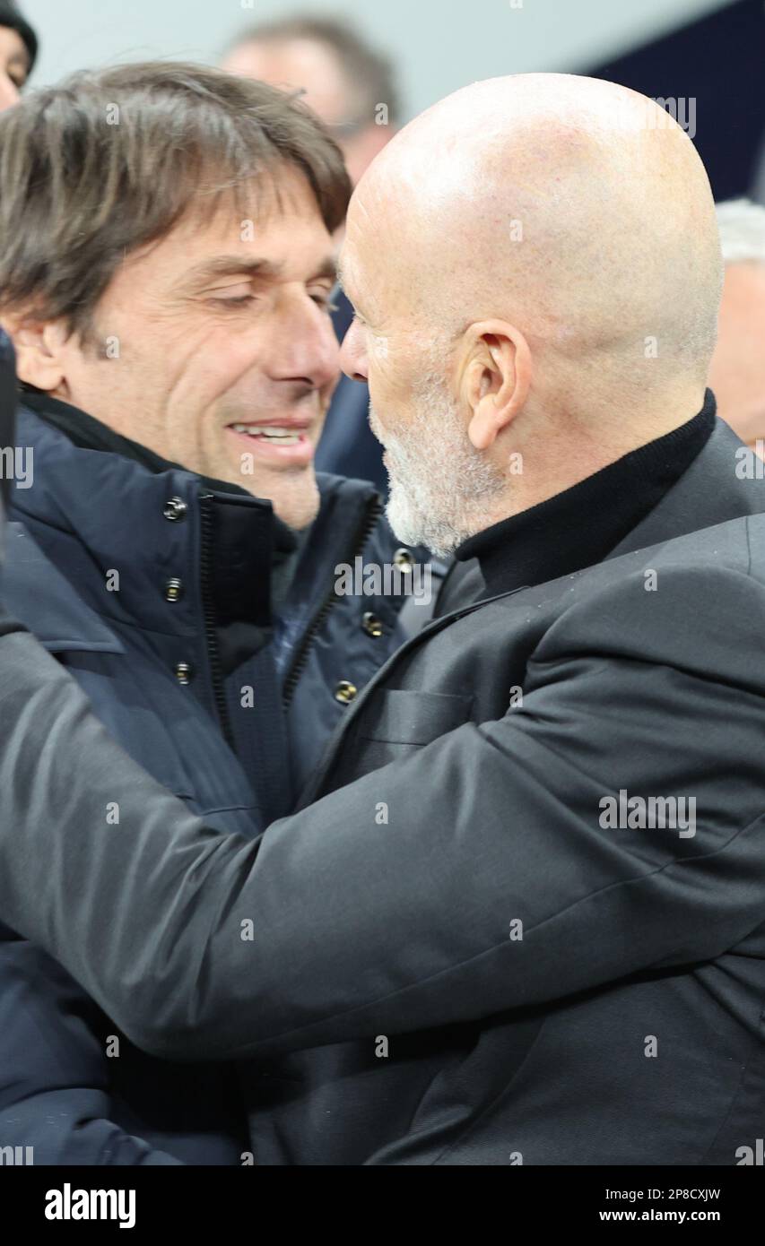 L-R Tottenham Hotspur manager Antonio Conte and Stefano Pioli Head Coach of AC Milan before kick ...