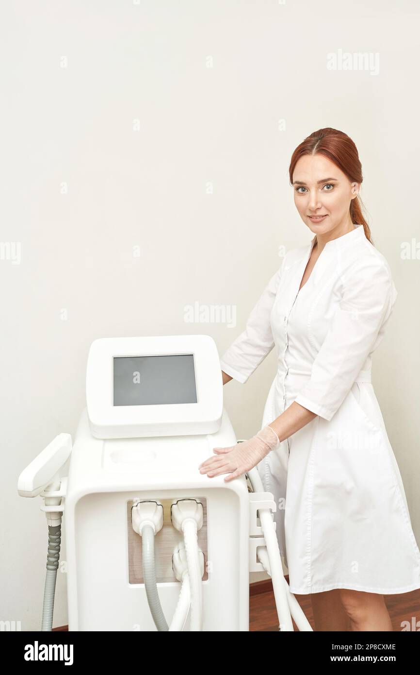 Laser hair removal treatment. Doctor holding. Clinic skin care procedure. Medical dermatology ...