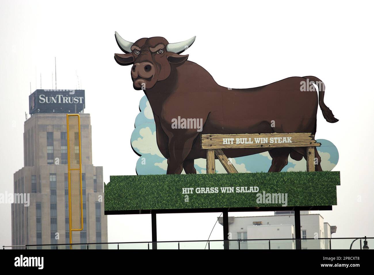 FILE - In this June 12, 2008 file photo, a bull is shown atop the left ...